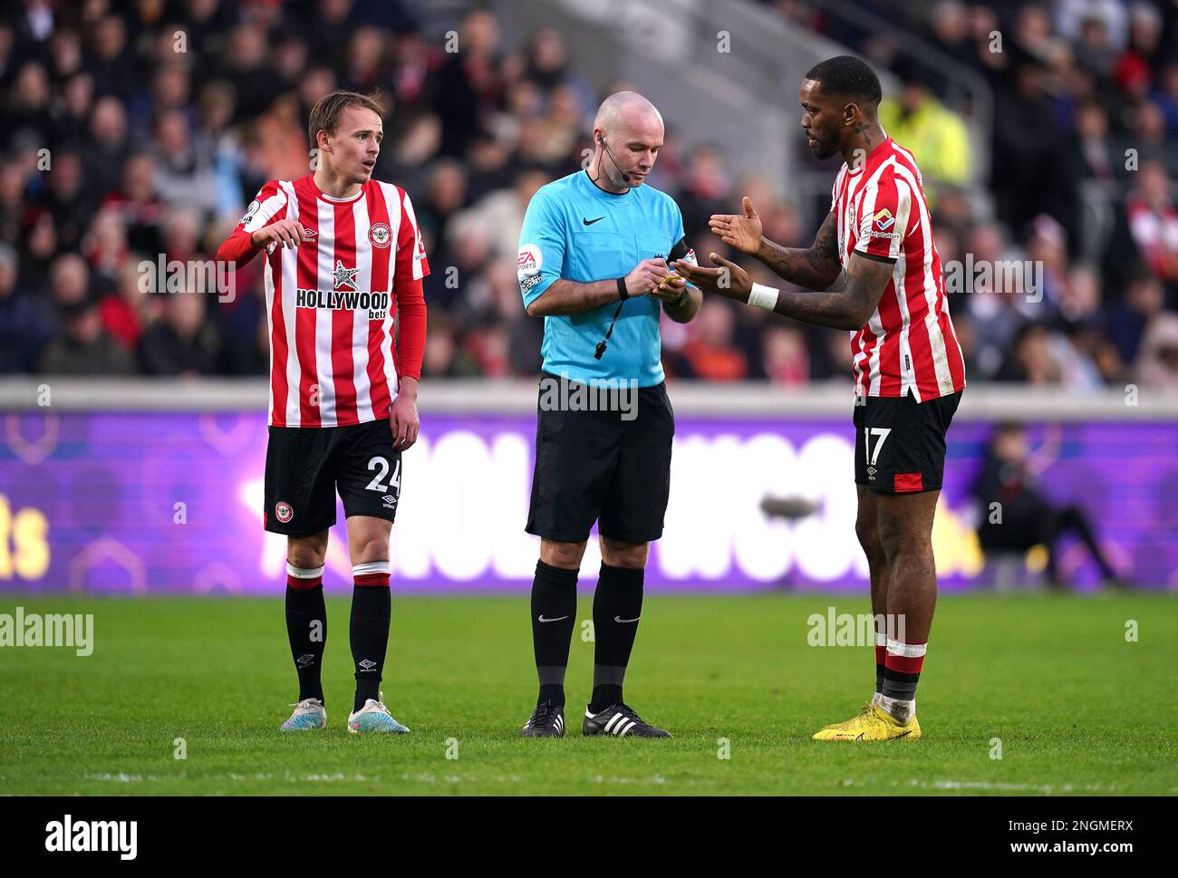 Brentford's Ivan Toney (right) speaks to referee Paul Tierney during ...