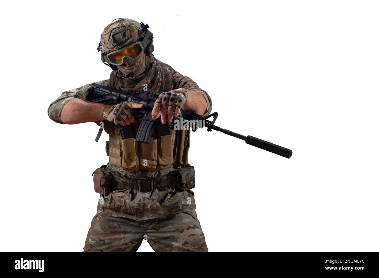 Cropped photo mercenary soldier walks with an automatic rifle in his ...