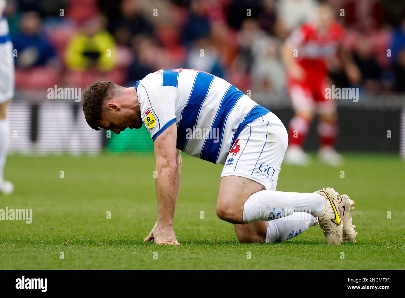 Queens Park Rangers' Chris Martin takes a knock during the Sky Bet ...