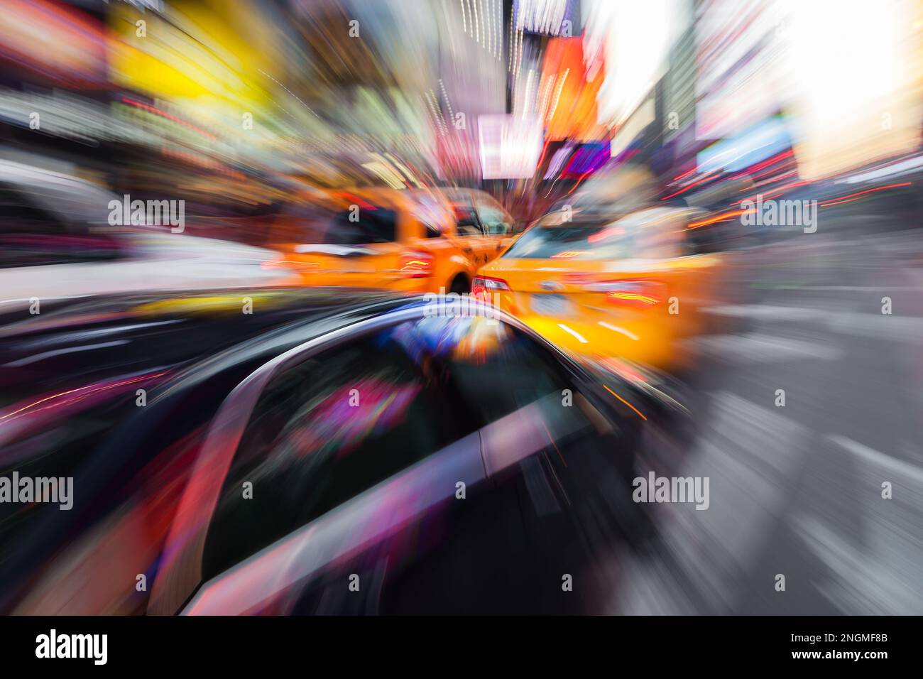 picture with camera made zoom effect of busy car traffic downtown of ...