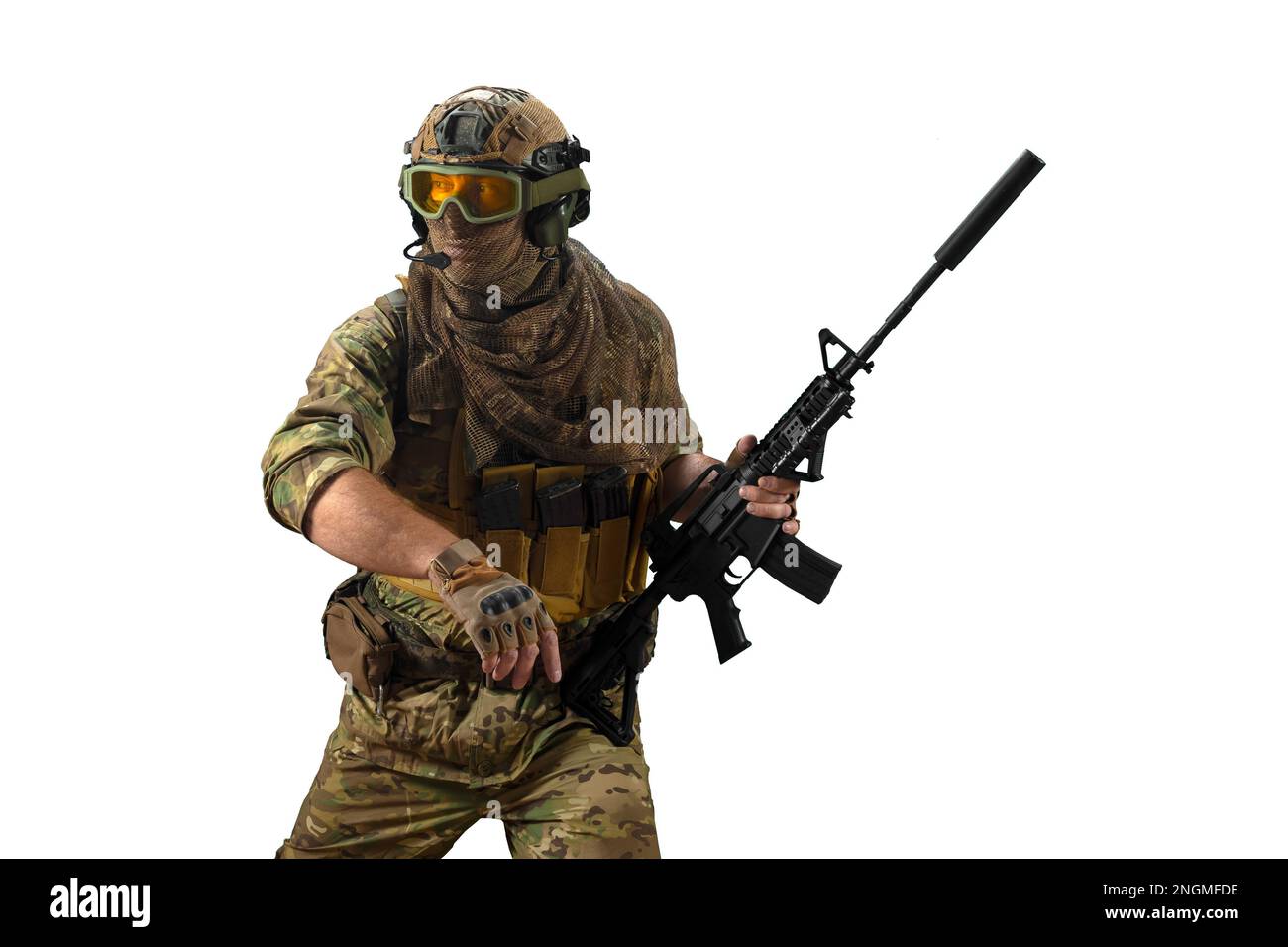 Mercenary soldier in camouflage clothes walks with an automatic rifle ...