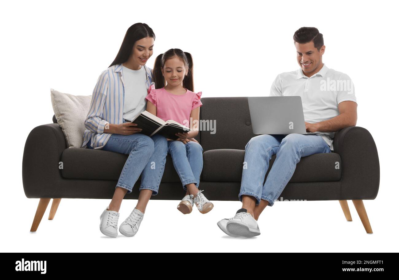 Happy family resting on comfortable grey sofa against white background ...