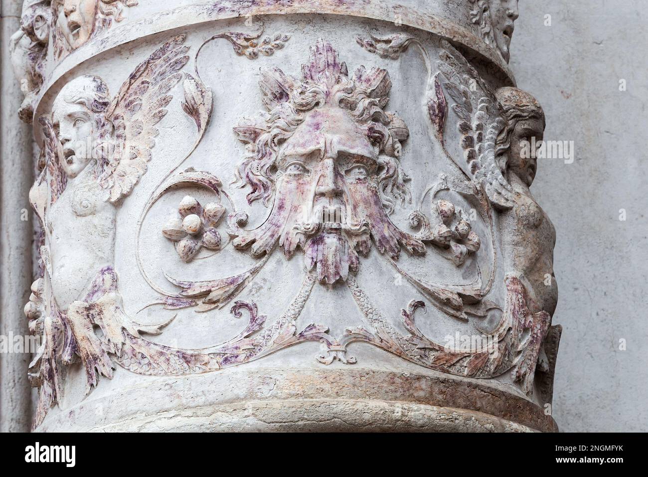 picture of a detail of a historical column in Venice, Italy, with rich ...