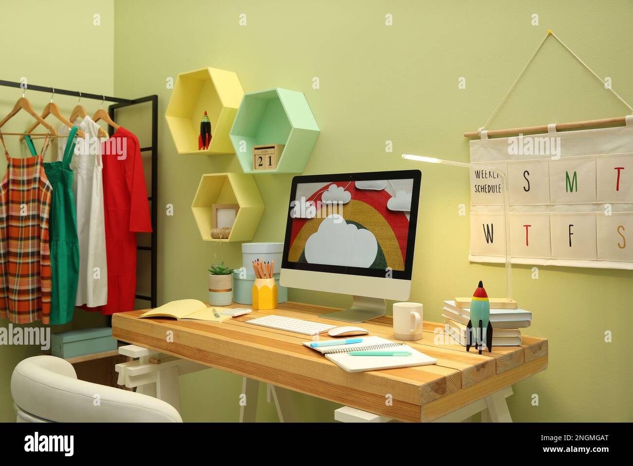 Stylish workplace with computer on wooden desk indoors. Interior design ...