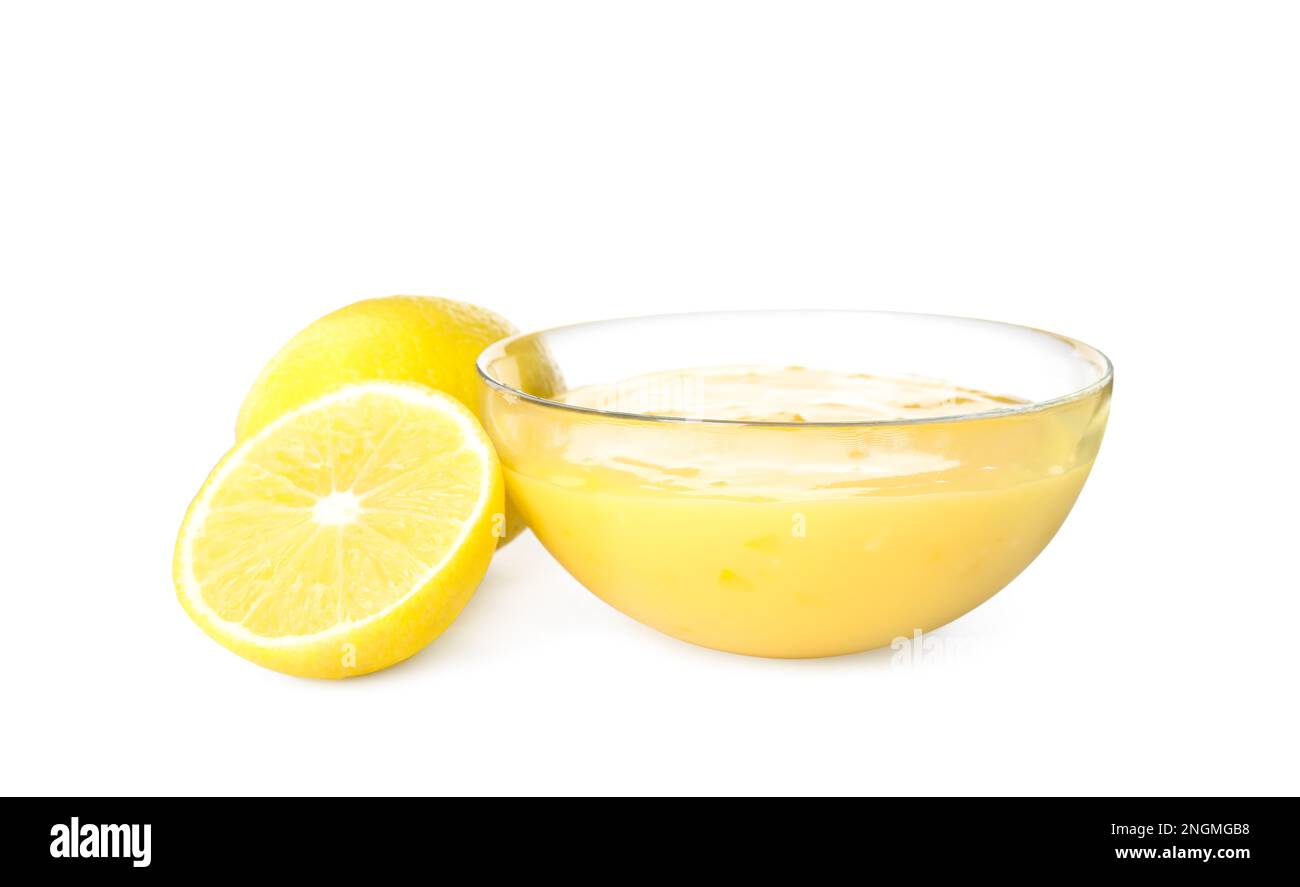 Delicious lemon curd and fresh fruits on white background Stock Photo ...