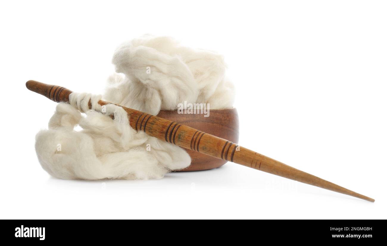 Heap of clean wool with wooden spindle and bowl isolated on white Stock ...