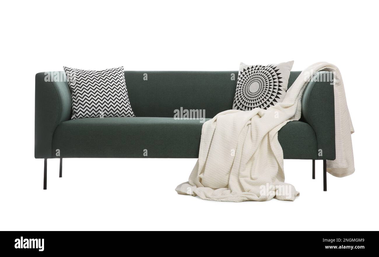 Comfortable green sofa with cushions and blanket on white background ...