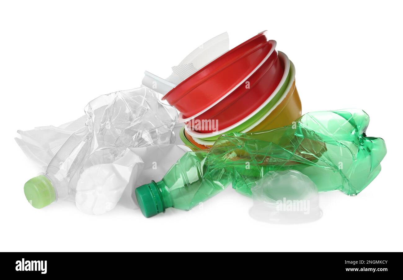Pile of different plastic items on white background Stock Photo - Alamy