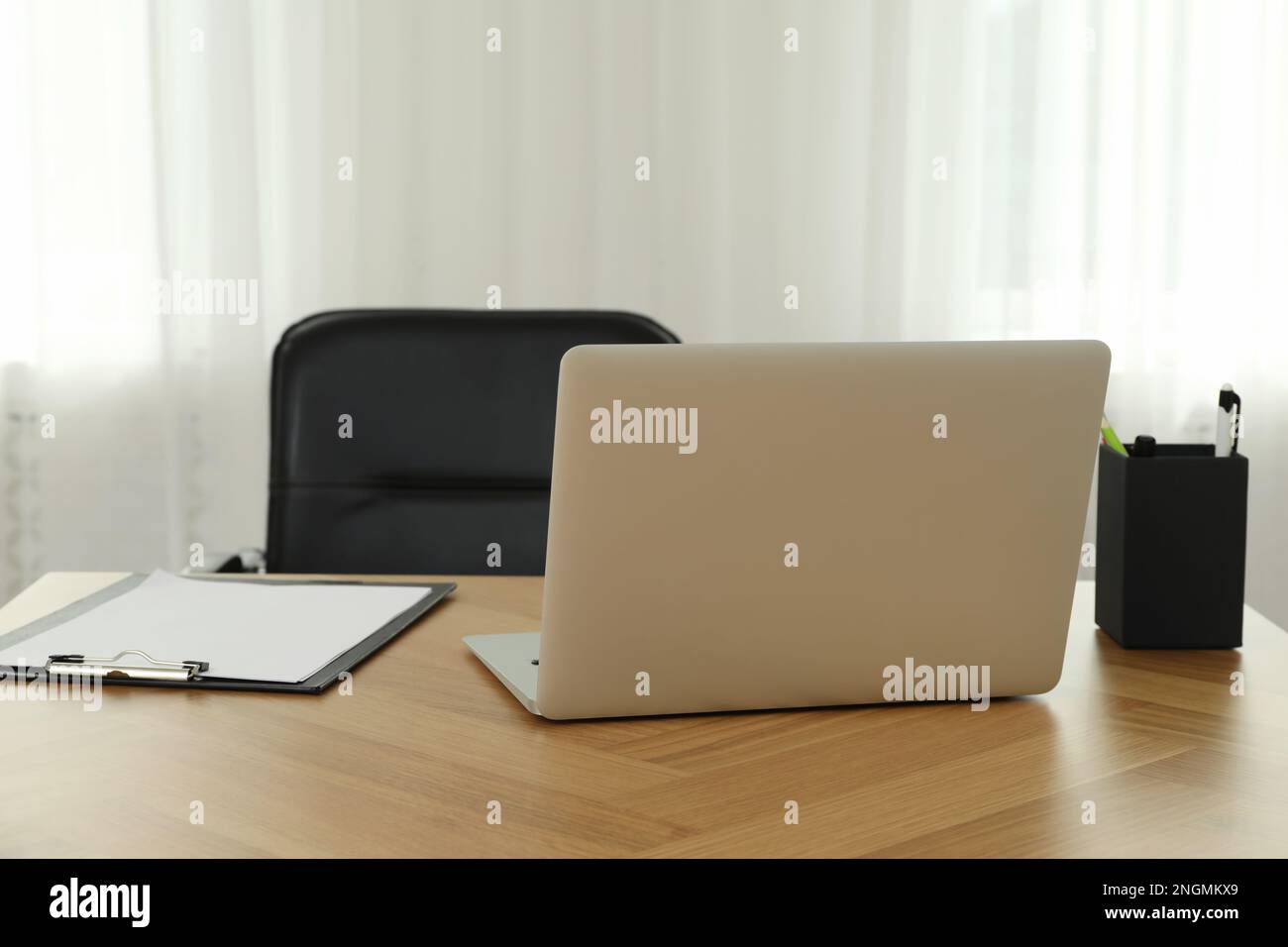 Stylish workplace with modern laptop near window in room. Interior ...