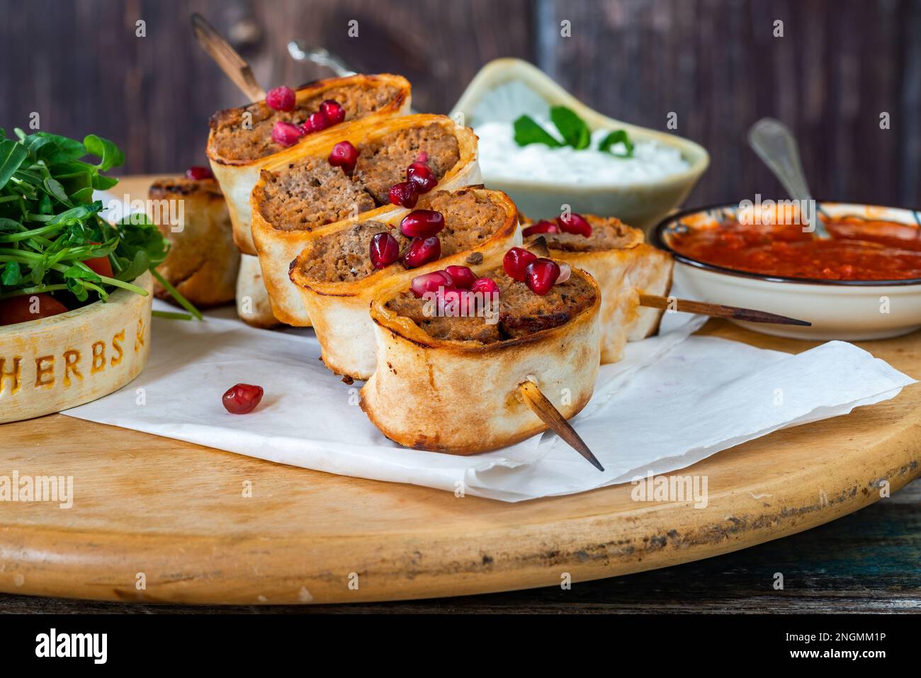 Beyti - Turikish lamb kofte-style kebab wrapped in flatbread Stock ...