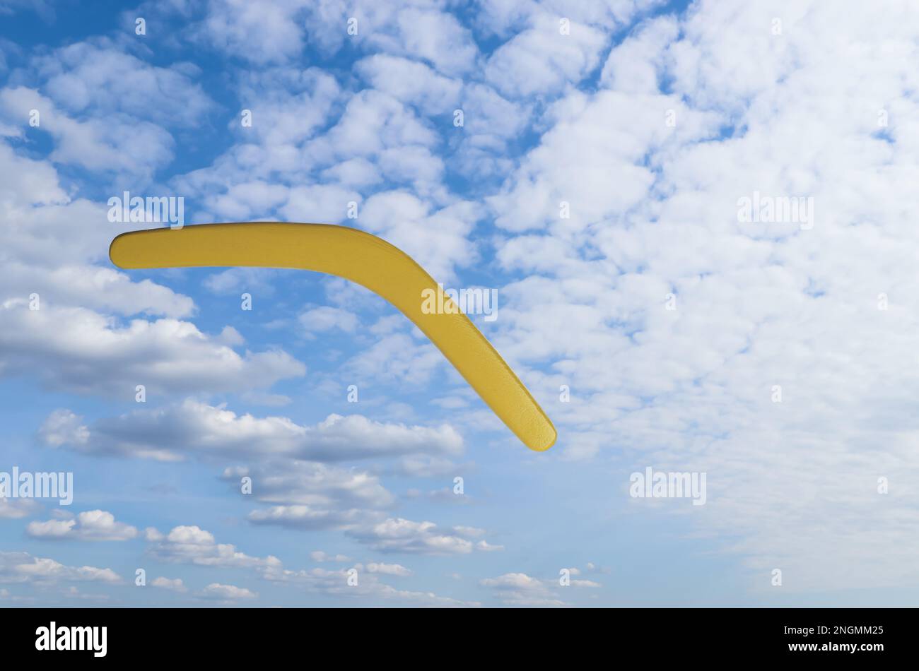 Throwing of boomerang against blue sky. Outdoor activity Stock Photo ...
