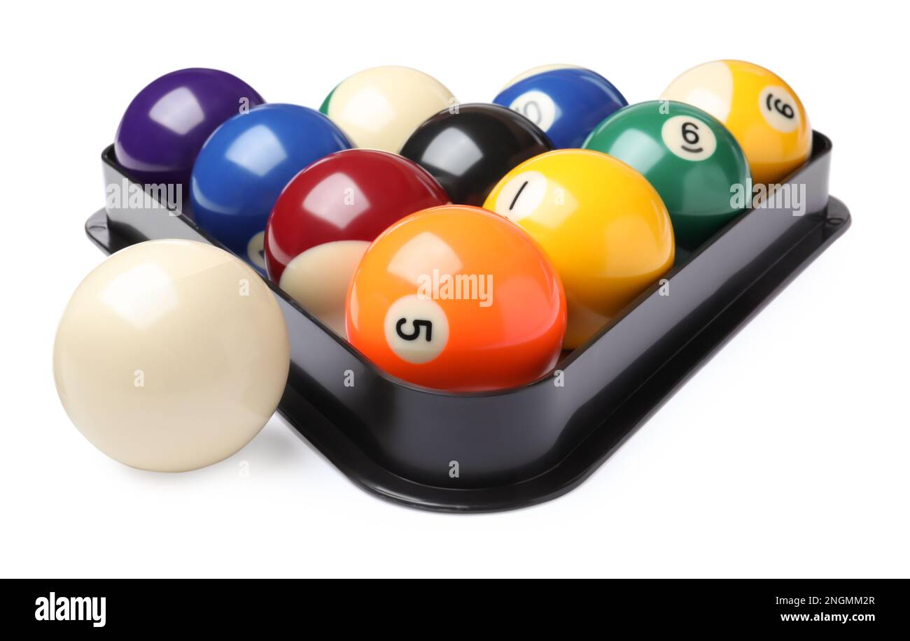 Plastic rack with billiard balls on white background Stock Photo - Alamy