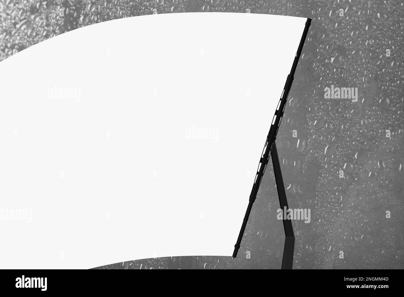 Car windshield wiper cleaning water drops from glass Stock Photo - Alamy