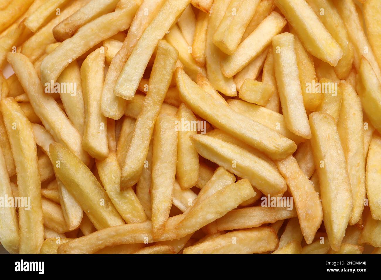 Yummy French fries as background, top view Stock Photo - Alamy