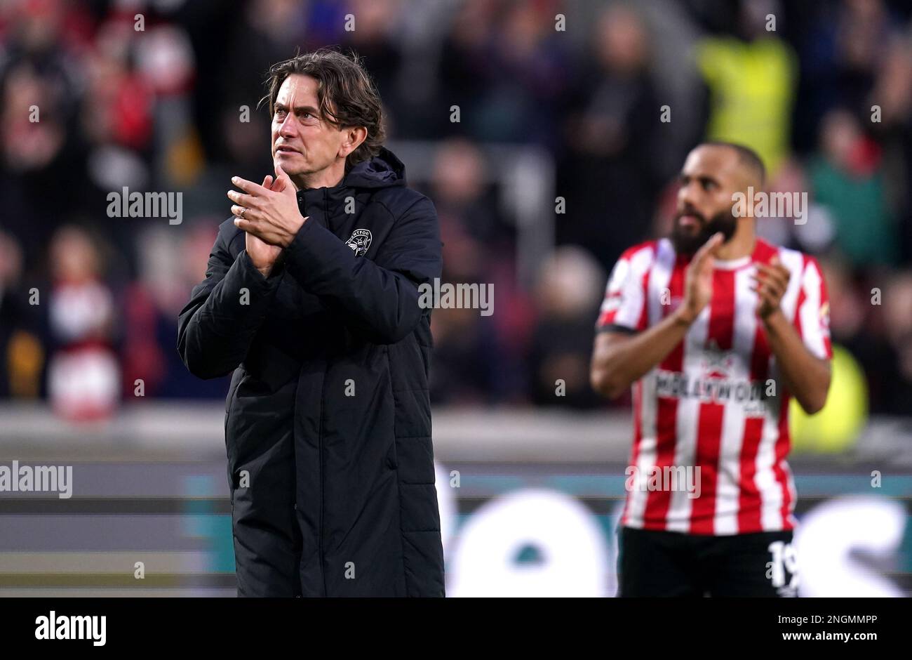 Brentford manager Thomas Frank (left) and Bryan Mbeumo applaud the fans ...