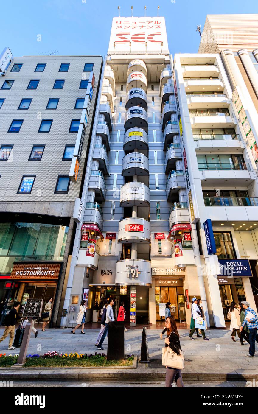 The Ginza Ibiza and SA Birth in the Act Building with people walking by ...