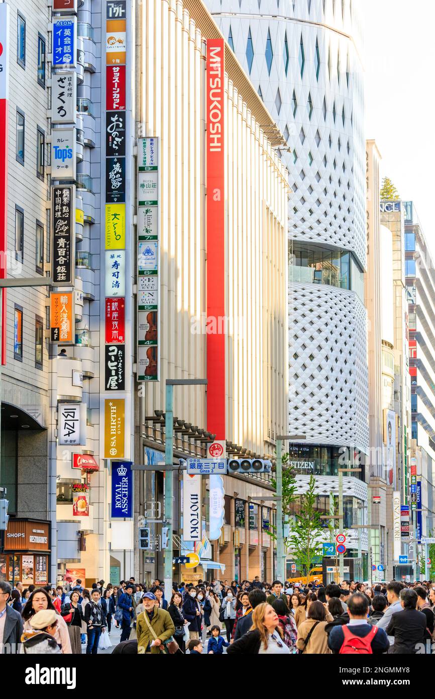View along Ginza in Tokyo, with the Mitsukoshi store and behind it the ...