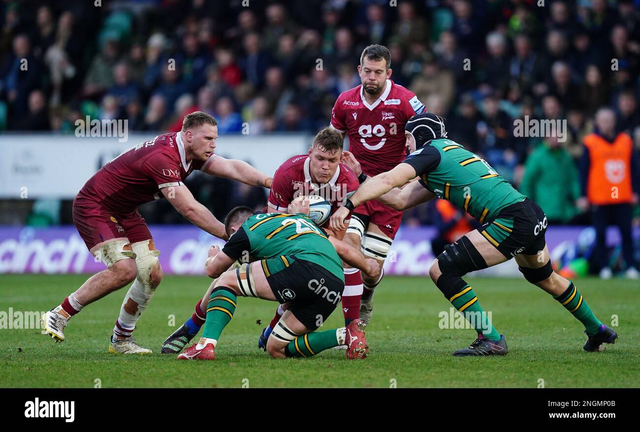 Sale's Cobus Wiese is tackled by Northampton's Sam Graham during the ...