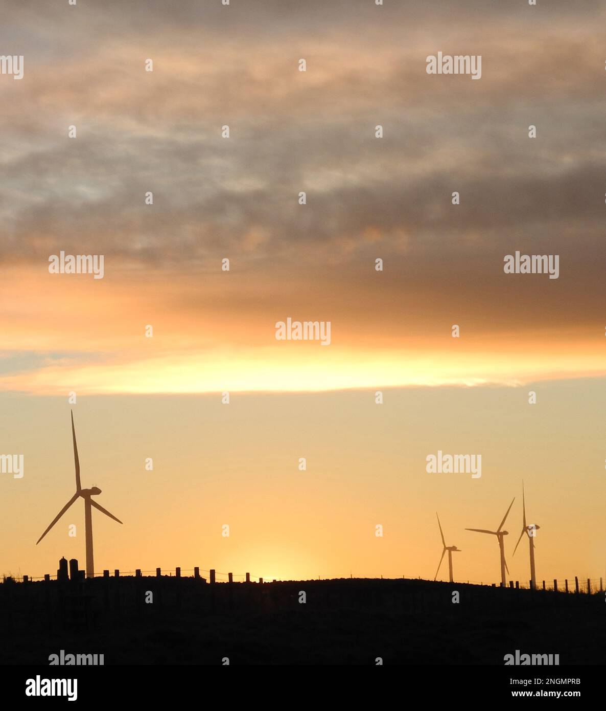 Wind turbines sunset golden hi-res stock photography and images - Alamy