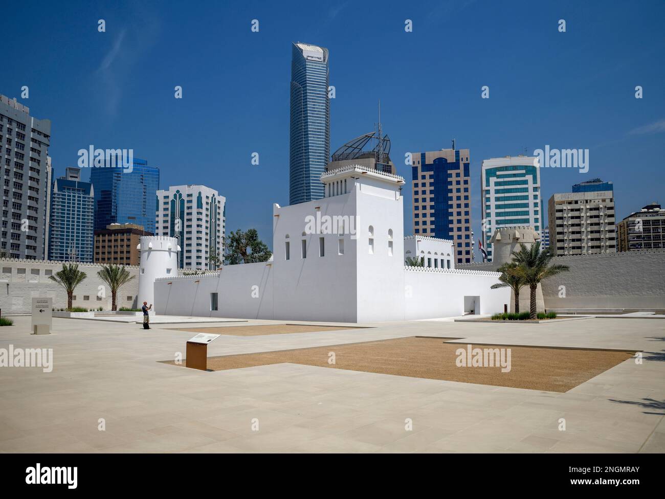 Old fort and museum Qasr al Hosn in front of skyscrapers, oldest ...