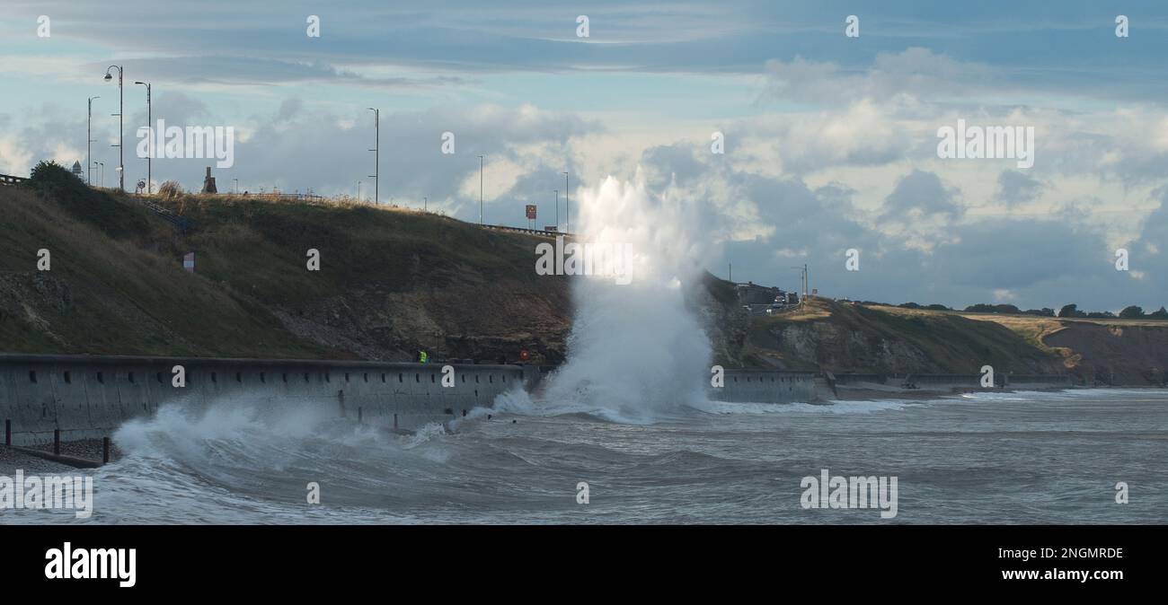 Powerful waves smash onto the promenade at Seaham throwing up a huge ...