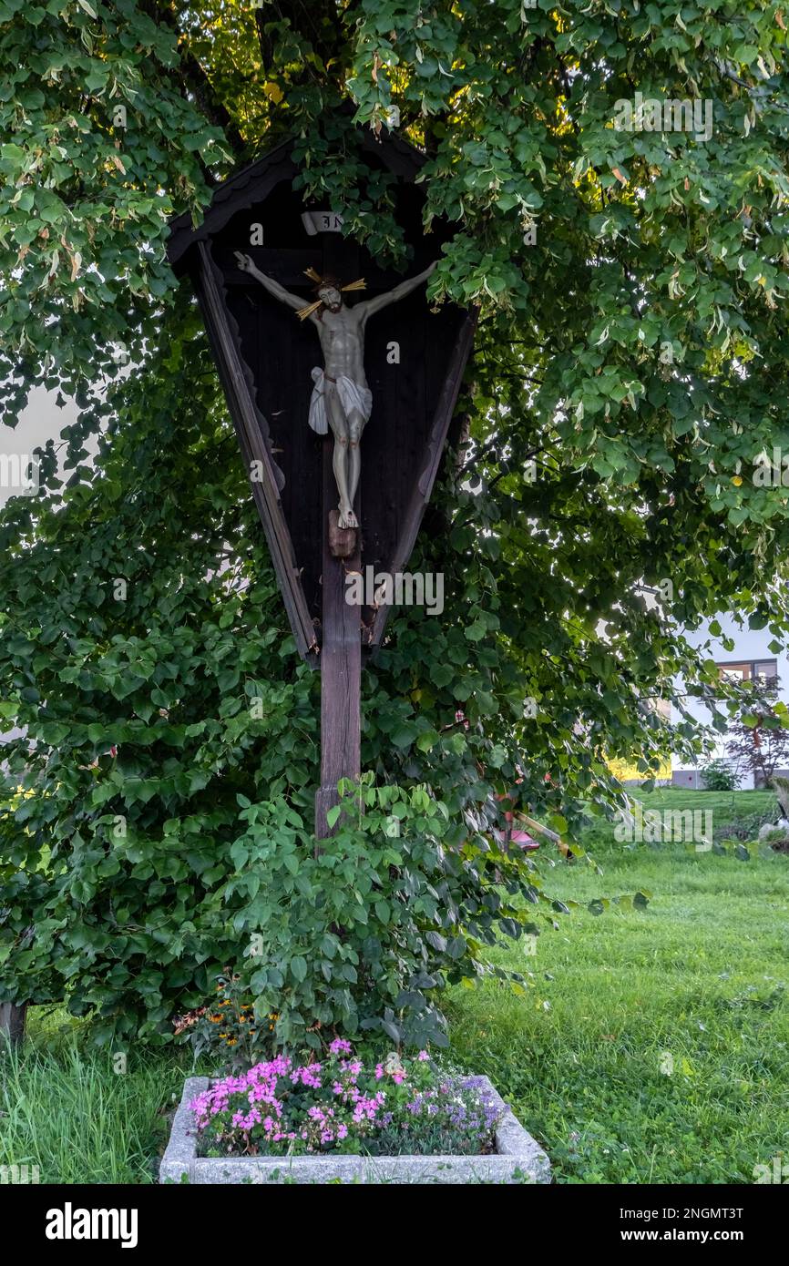 Field cross with Christ figure Stock Photo - Alamy