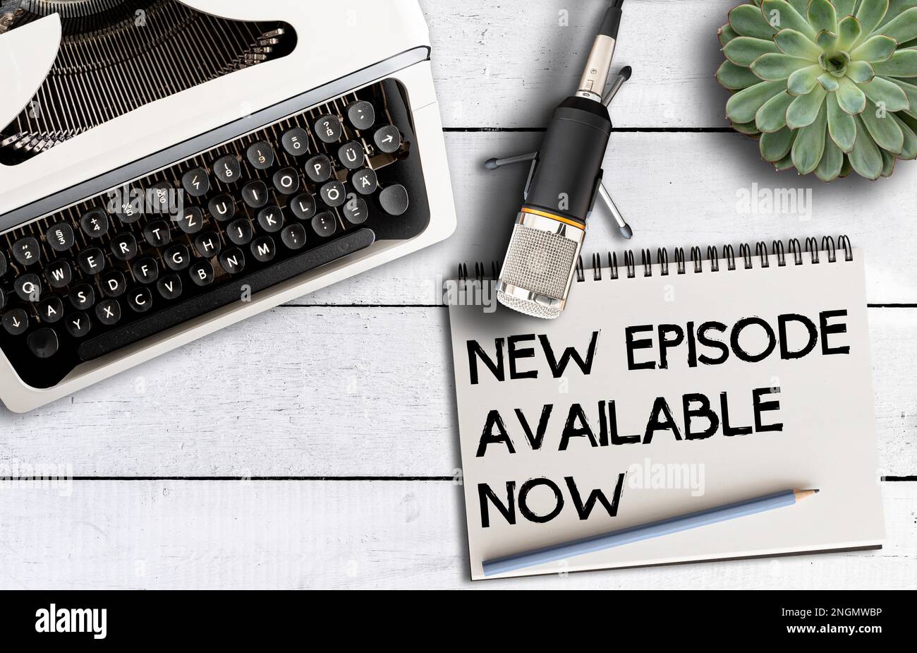 podcast concept, top view of microphone on desk with old typewriter and ...
