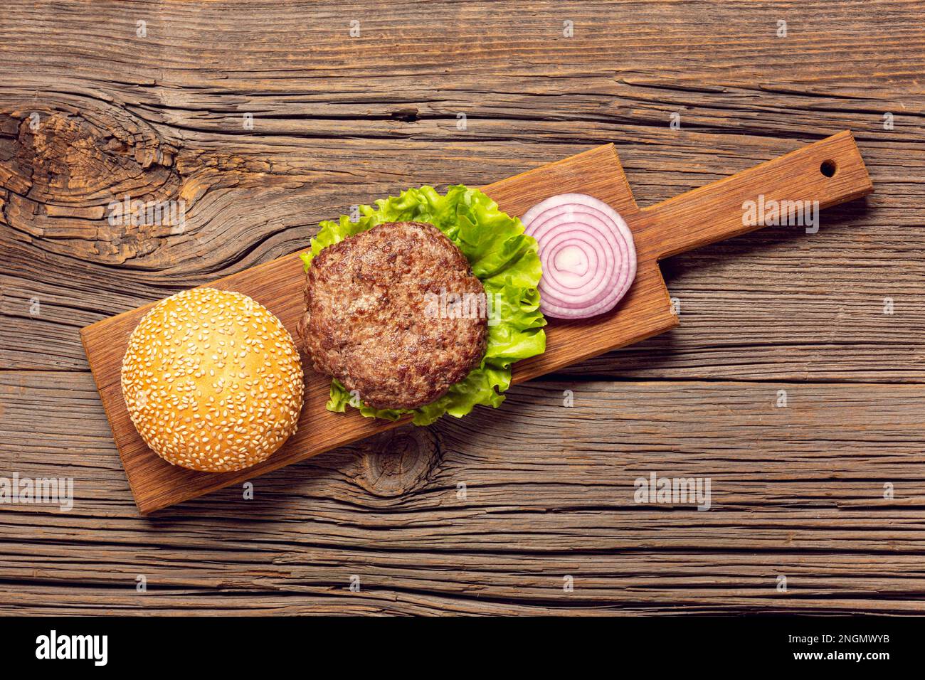 flat lay burger ingredients cutting board. High resolution photo Stock ...
