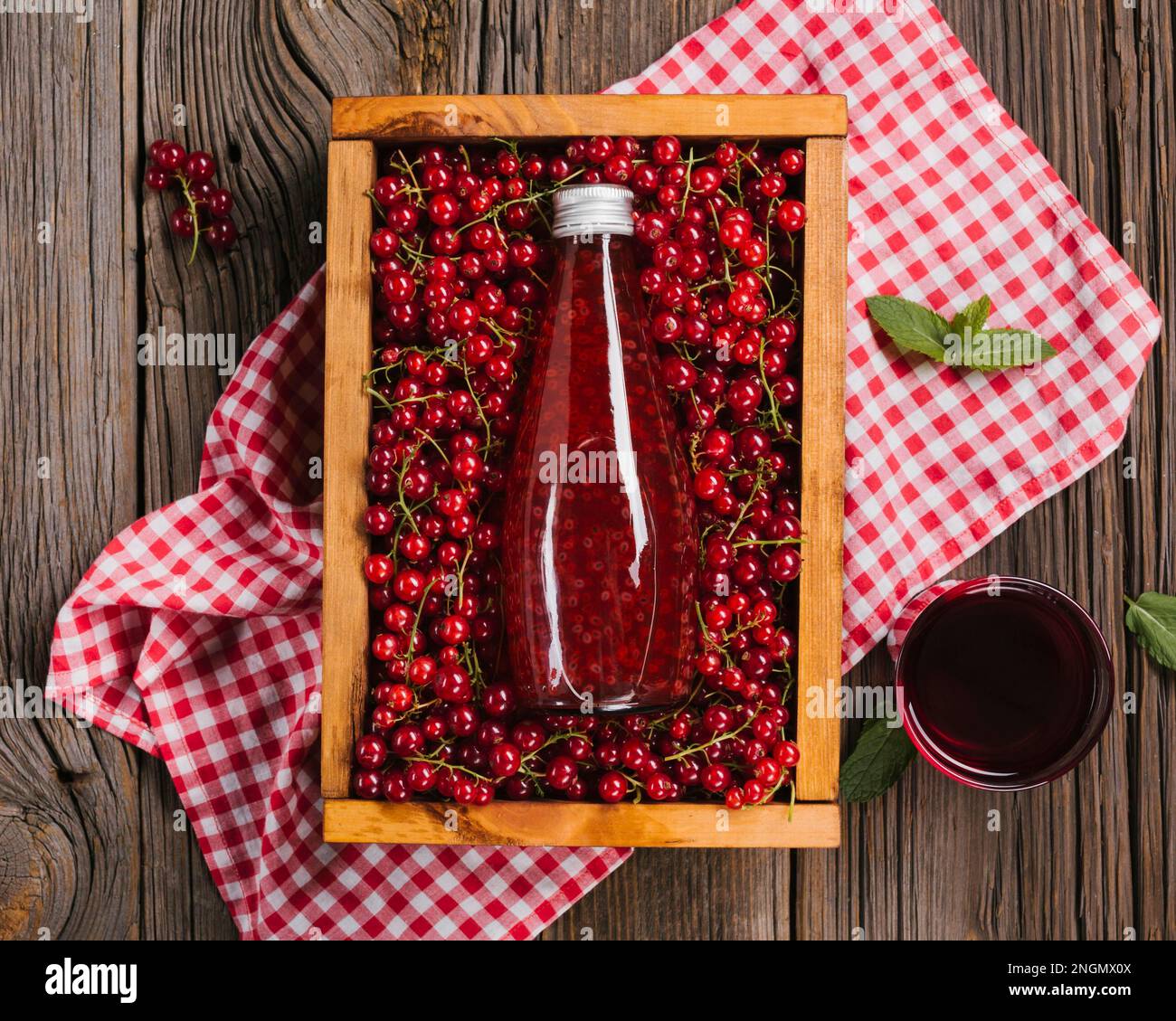 cranberry juice bottle wooden background Stock Photo - Alamy