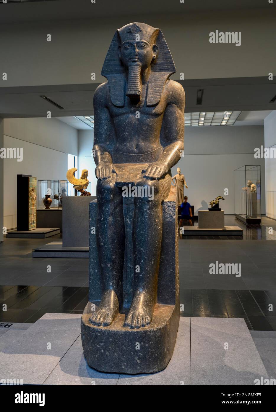Statue of Pharaoh Ramses II on his throne, 13th century BC, Louvre Abu Dhabi, Saadiyat Island ...
