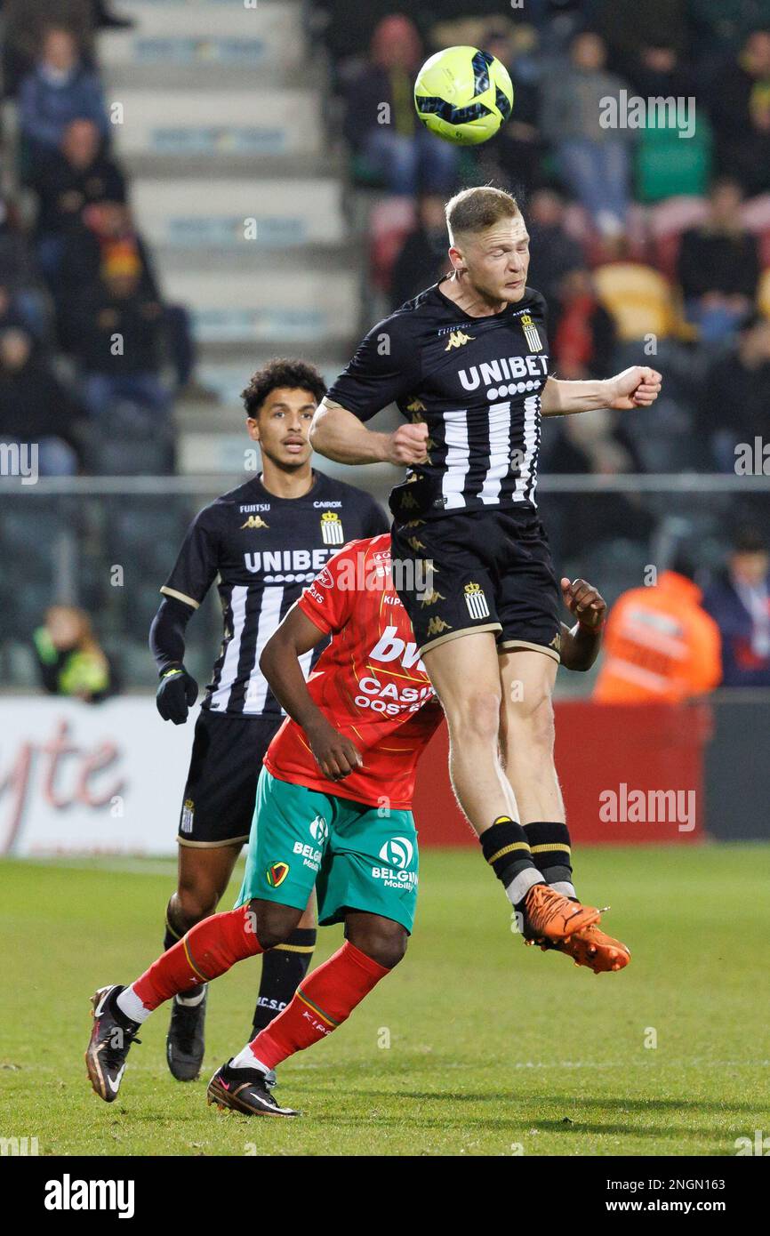 Oostende's Thierry Ambrose and Charleroi's Jules Van Cleemput fight for the ball during a soccer ...