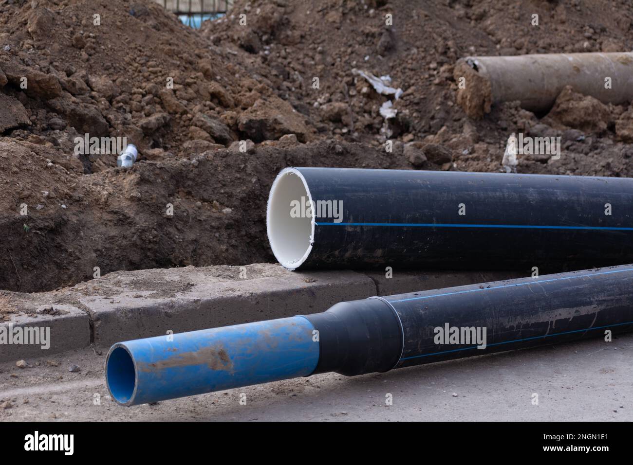 Sanitary piping. Plastic stacked PVC plastic industrial pipes. Plastic ...