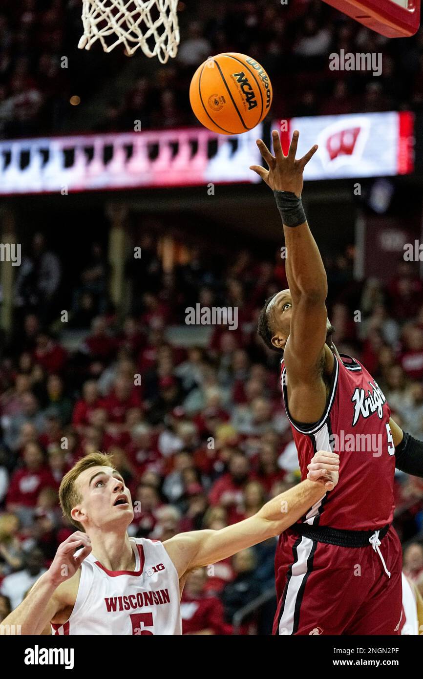 Rutgers' Aundre Hyatt (5) shoots over Wisconsin's Tyler Wahl, left ...