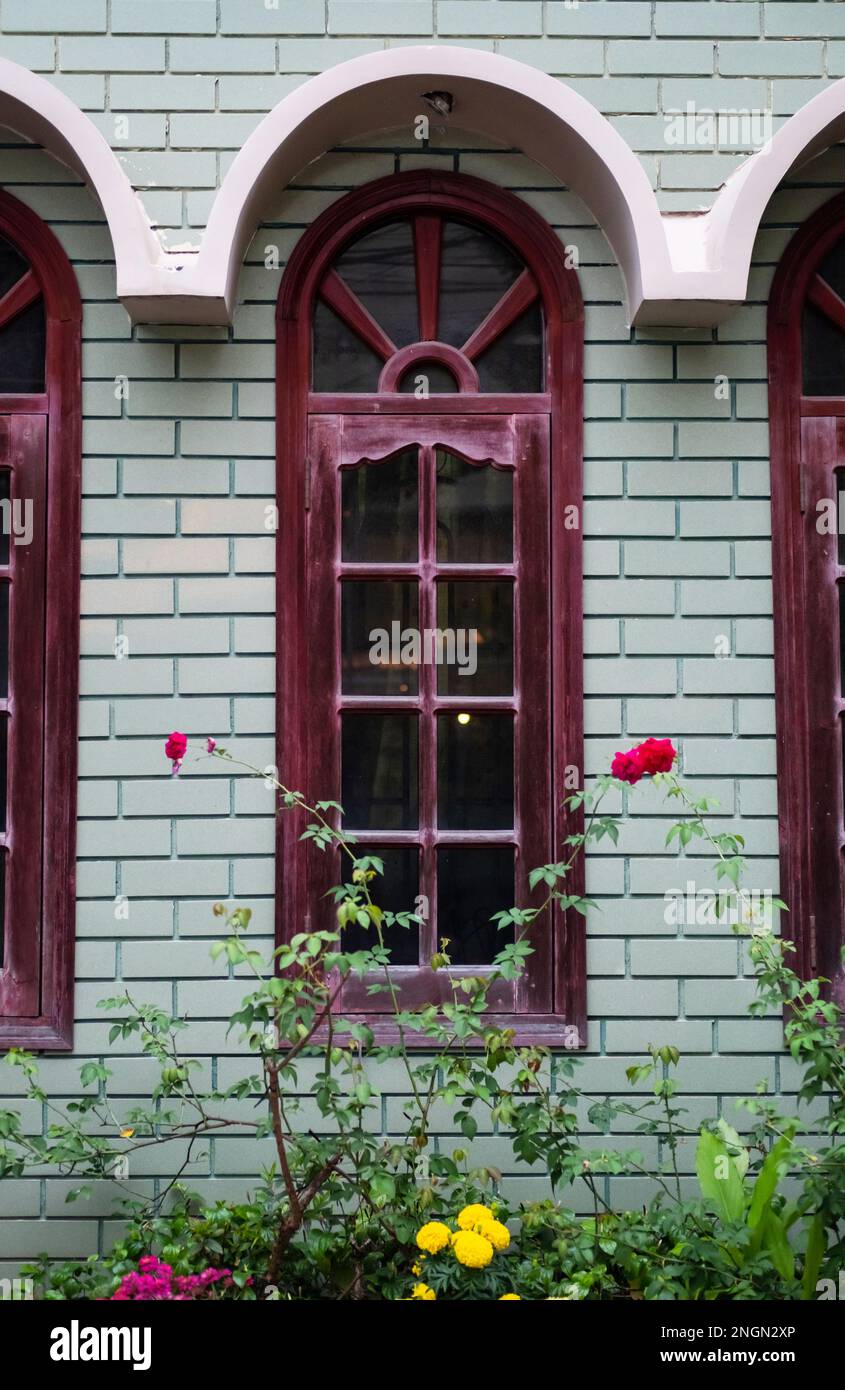 Vintage wooden window. Antique residental exterior with flowers Stock ...