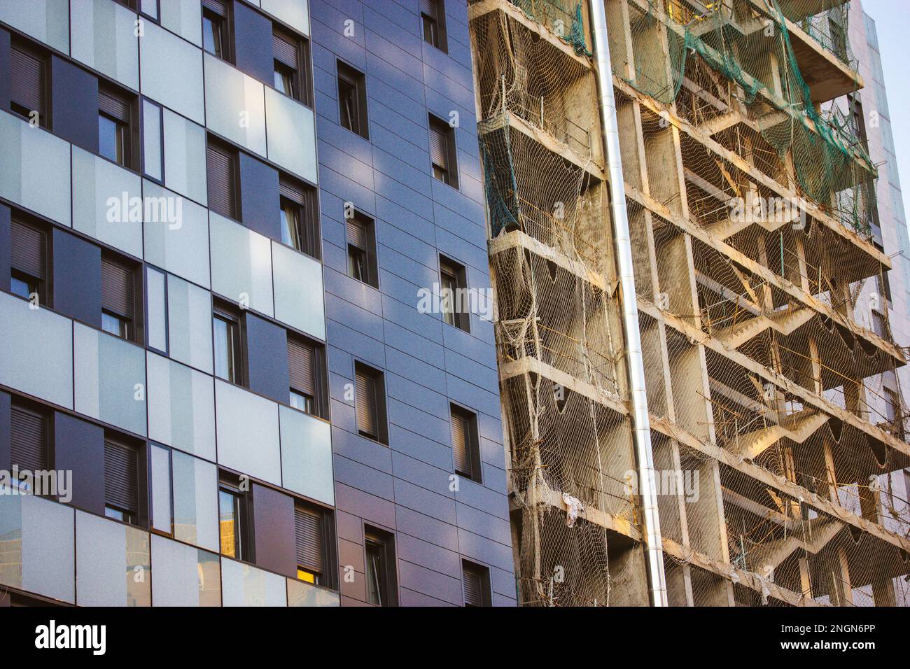 Tall high-rise modern apartment or office building facade. Comparison ...