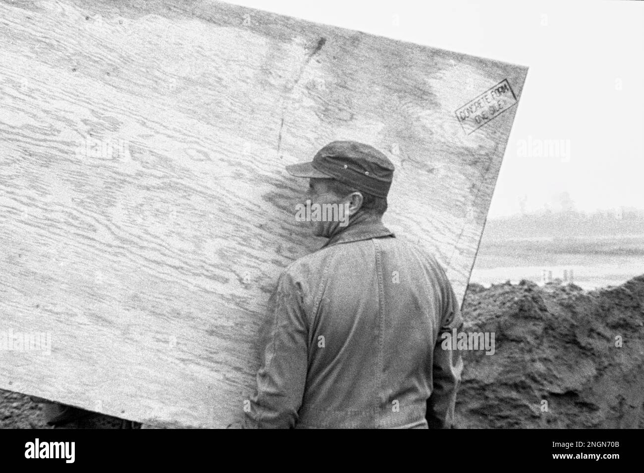 Construction worker on an outdoor site in 1971. Retro or vintage ...