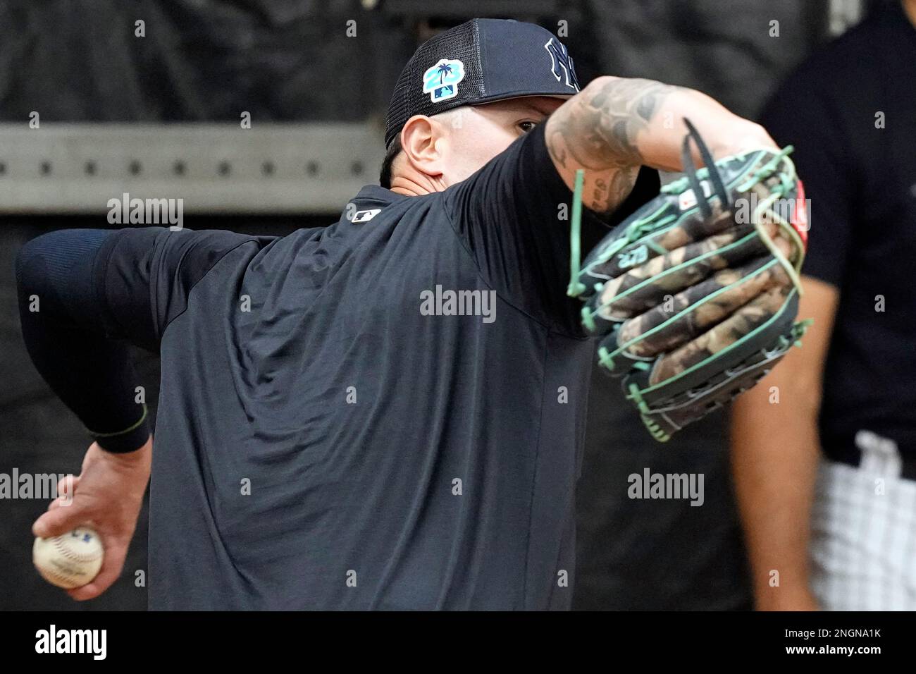 New York Yankees pitcher Nick Ramirez throws during a spring training ...