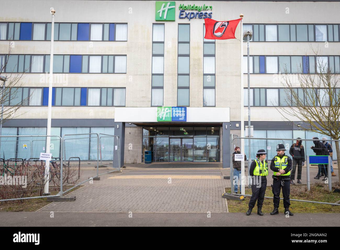 Rotherham, UK. 18th Feb, 2023. An Antifa flag is raised outside the ...