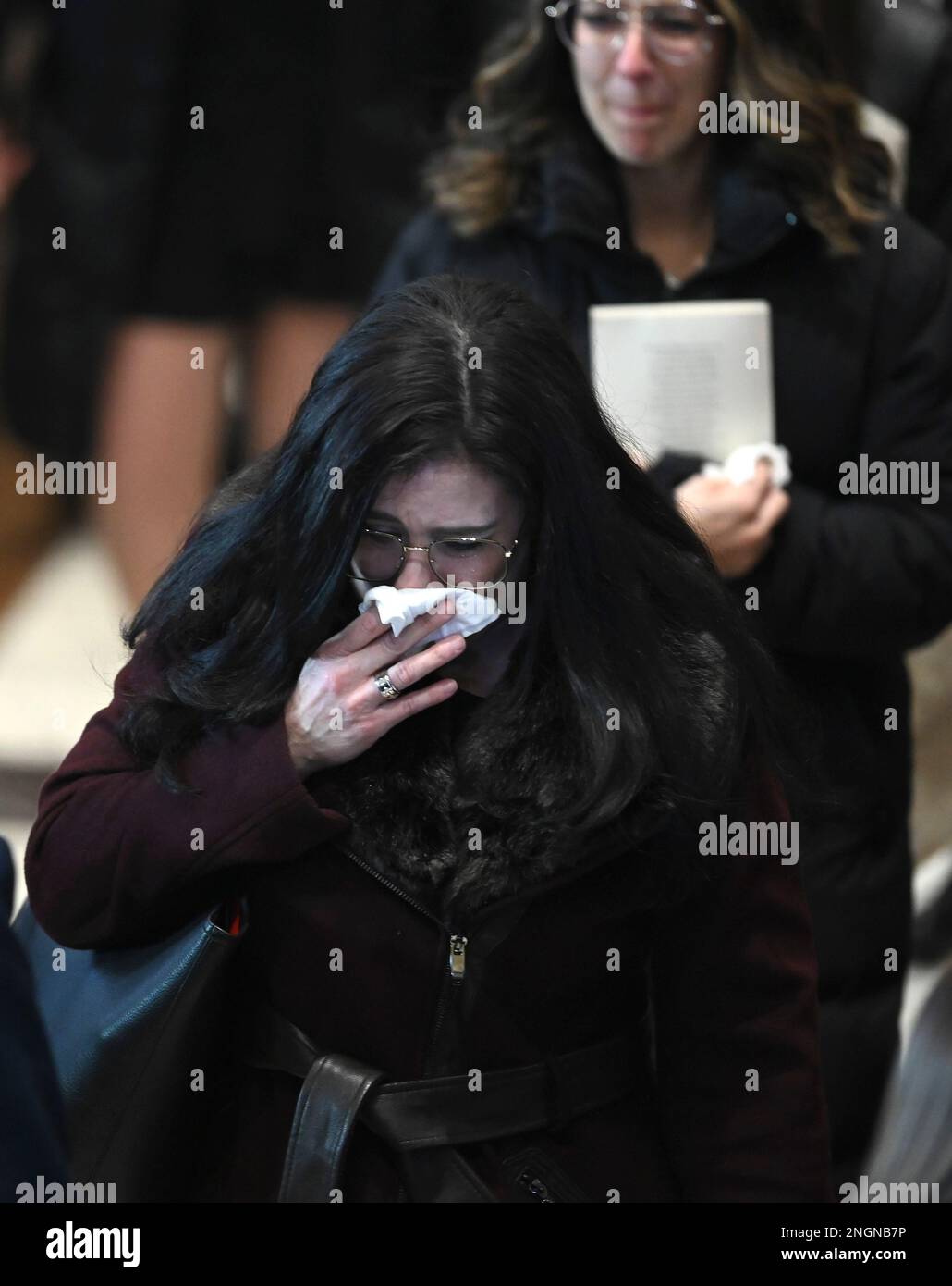 Family members, friends and supporters leave the funeral mass for Brian ...