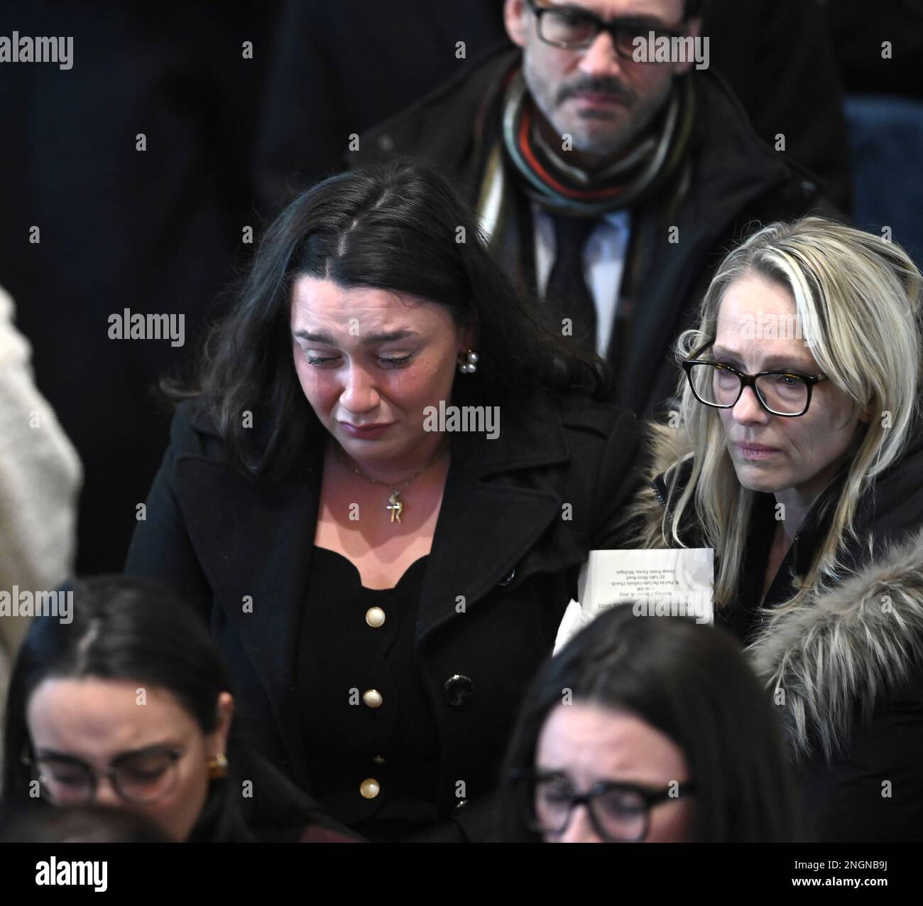 Family members friends and supporters leave the funeral mass for Brian ...