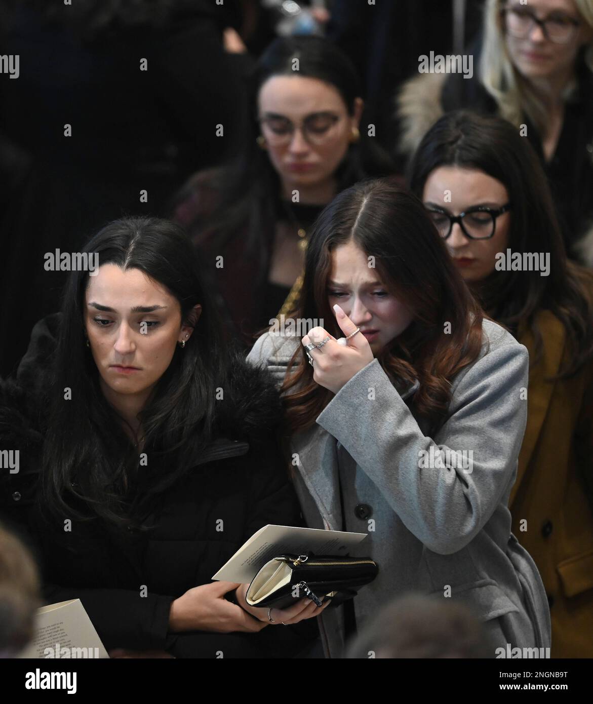 Family members friends and supporters leave the funeral mass for Brian ...