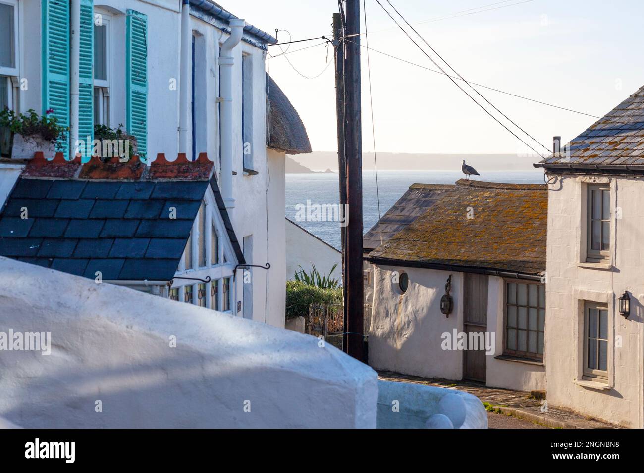 Old Cornish cottages in Porthleven aglow with morning sunshine Stock ...