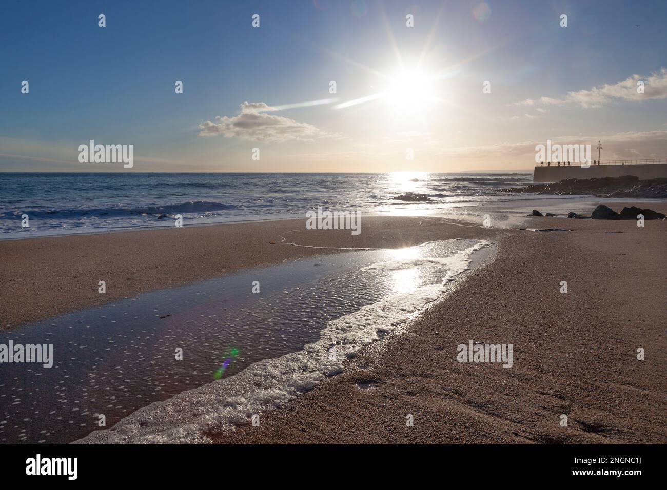A sandbar created by the sands shifting on Porthleven beach Stock Photo ...