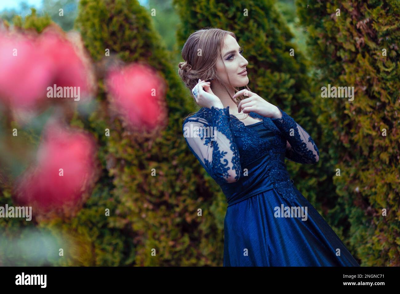 Beautiful girl in glamorous ultramarine dress. Ready for her prom night ...