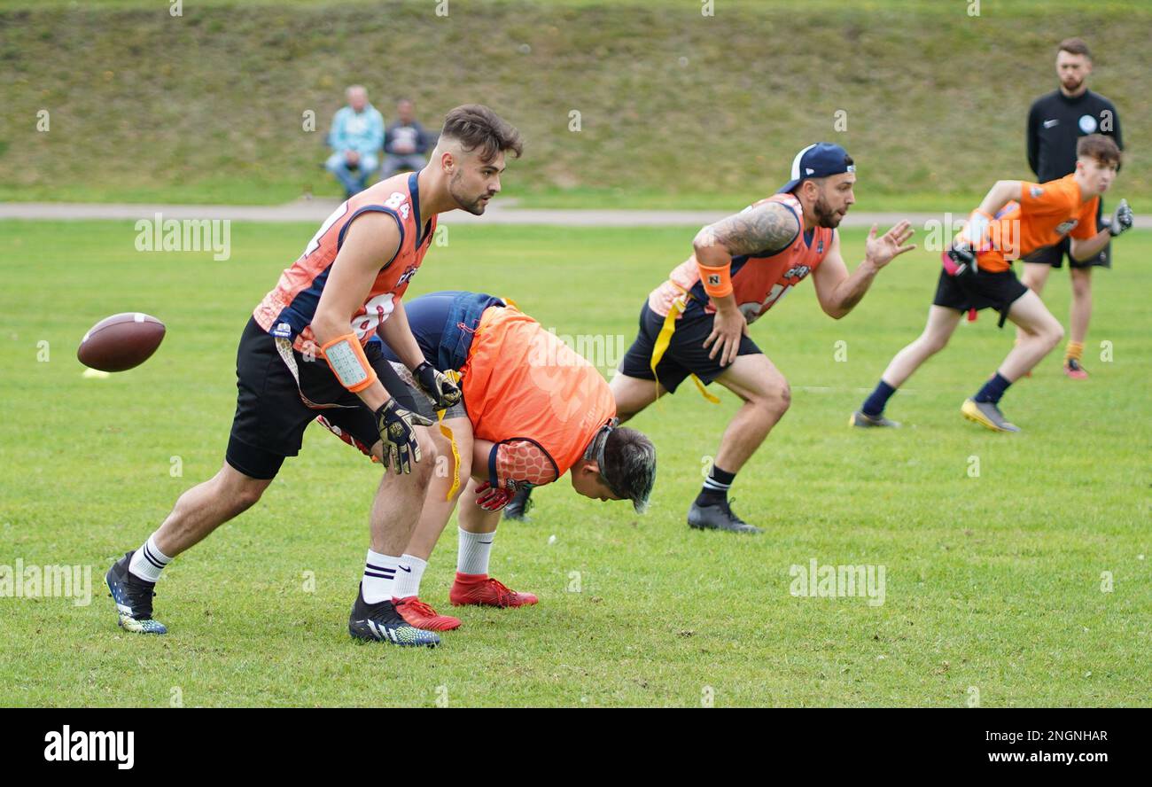 Snapping the ball from the line of scrimmage during a Flag Football ...