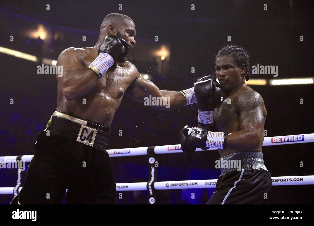 Cheavon Clarke (left) and Israel Duffus in action during their ...