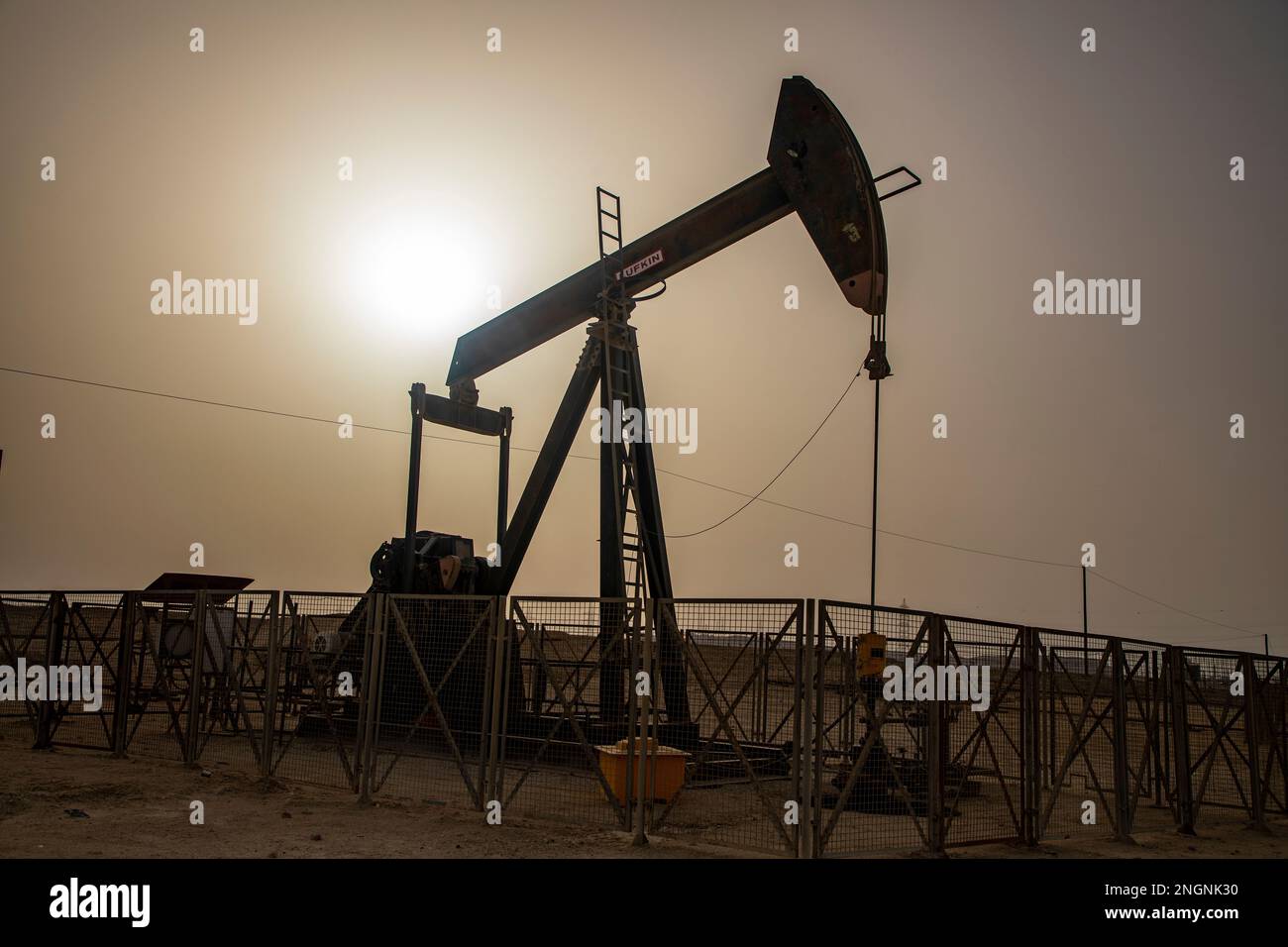 Pumpjack aka oil horse, nodding donkey, oil jack, beam pump raises ...