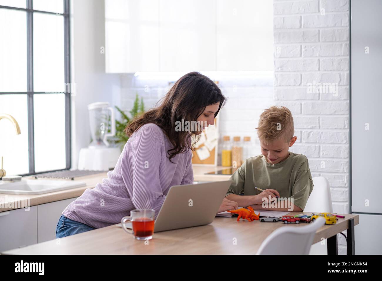 Work from home and family education, Mom and son using remote access ...