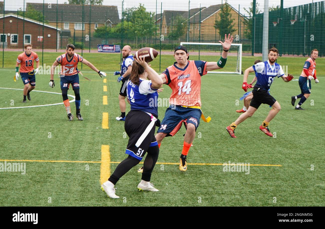 Rusher pressuring the Quaterback during a Flag Football game in Wales ...