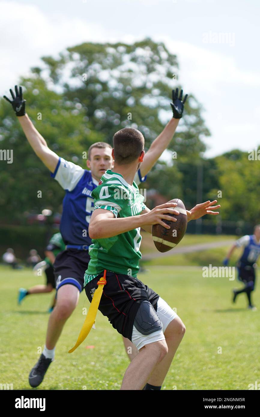 Rusher pressuring the Quaterback during a Flag Football game in Wales ...